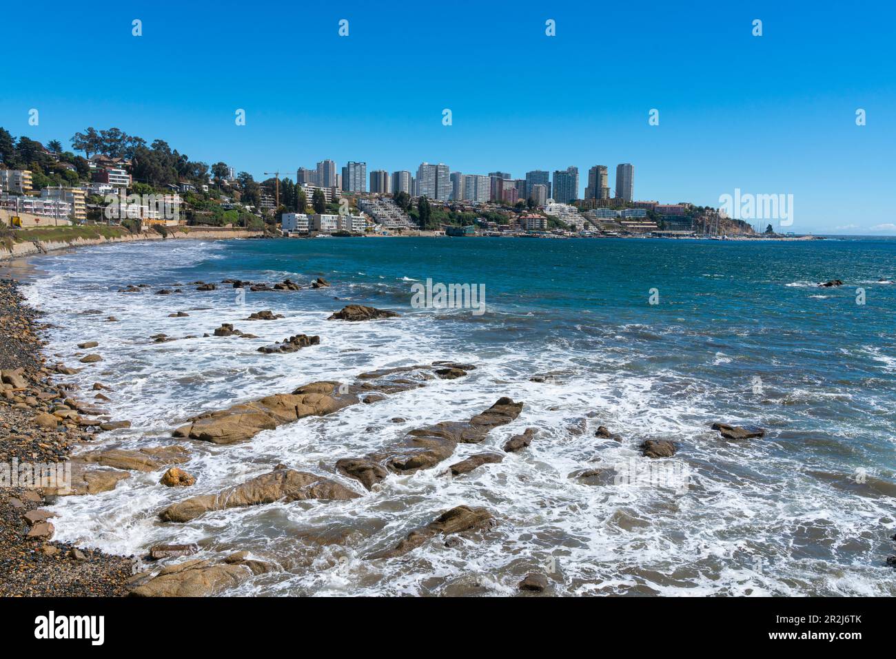 Bahamas beach and highrise buildings in background, Concon, Valparaiso ...