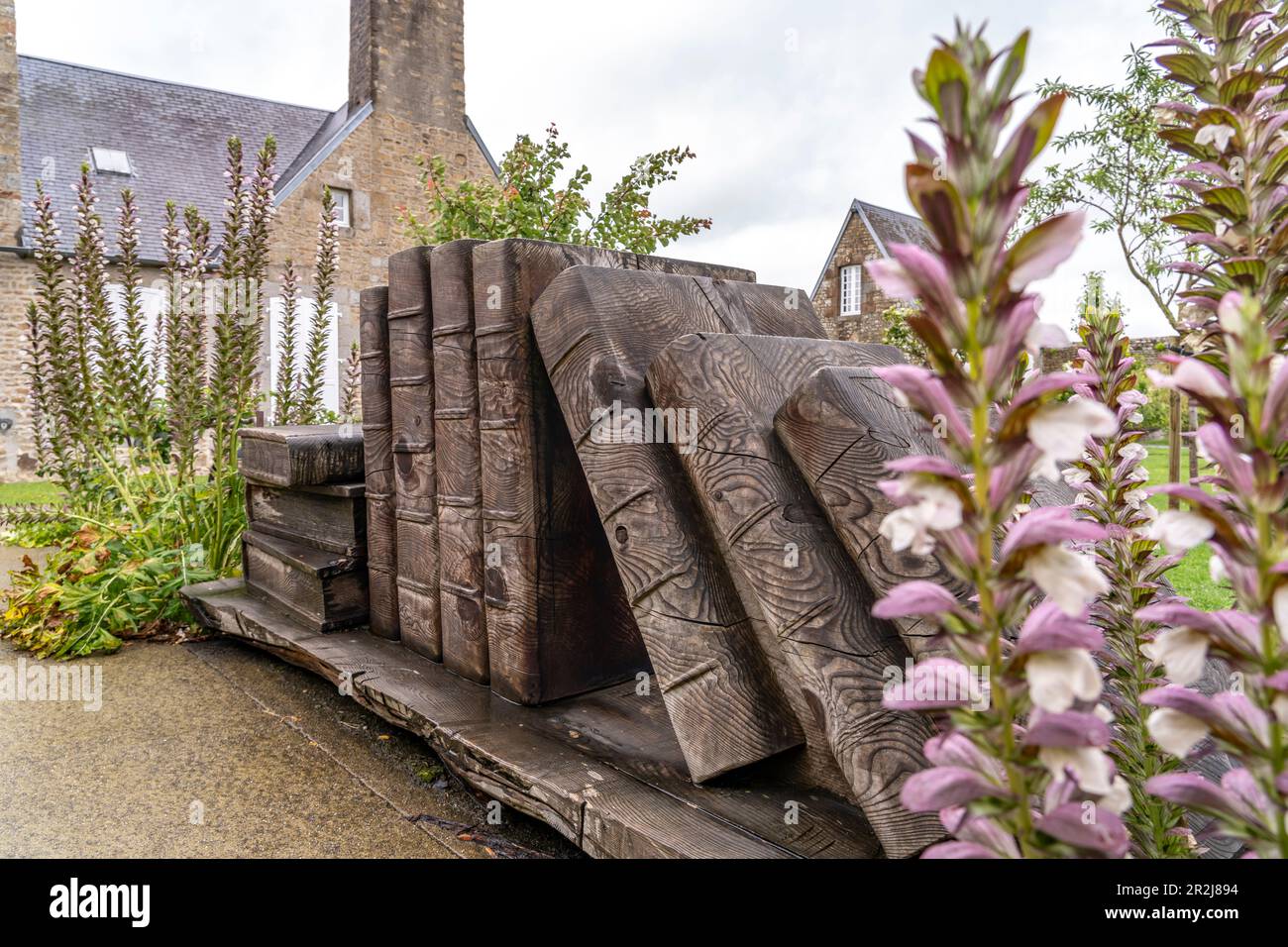 Sculpture with books in wood in the courtyard of Avranches Castle ...
