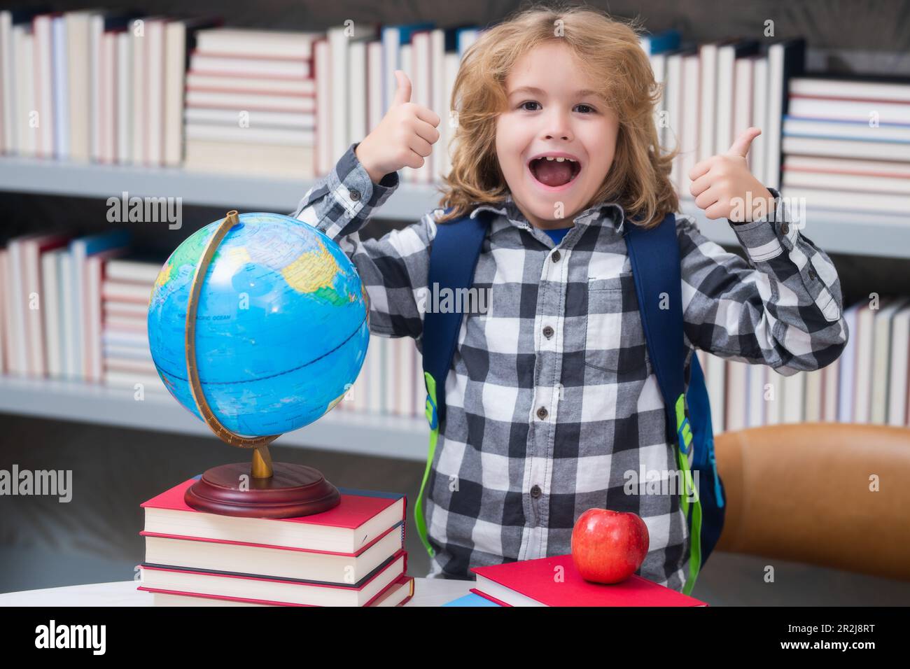Excited pupil. Little student school child. Portrait of nerd student ...