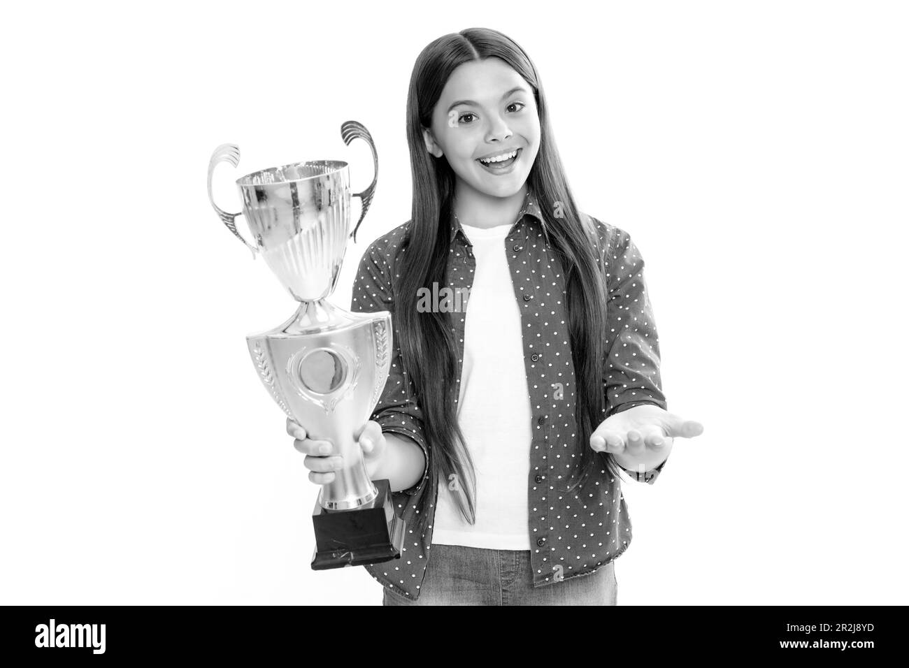 Teenage girl holding a trophy. Kid winner child won the competition ...