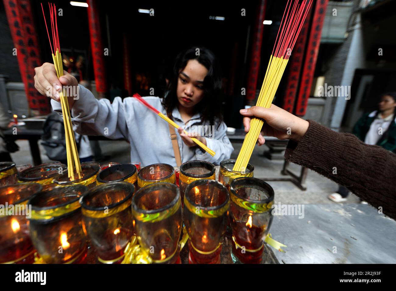 The Thien Hau Temple, the most famous taoist temple in Cholon, woman ...
