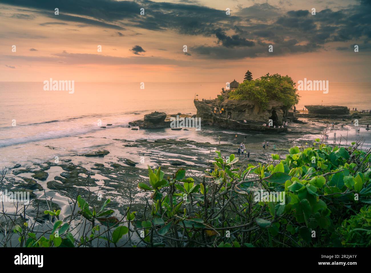 View of Tanah Lot, traditional Balinese temple at sunset, Beraban ...