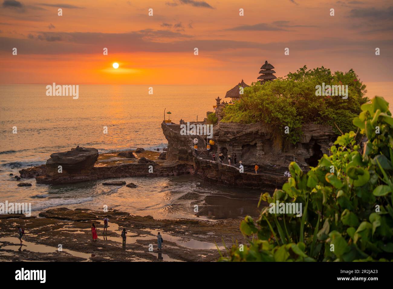 View of Tanah Lot, traditional Balinese temple at sunset, Beraban ...