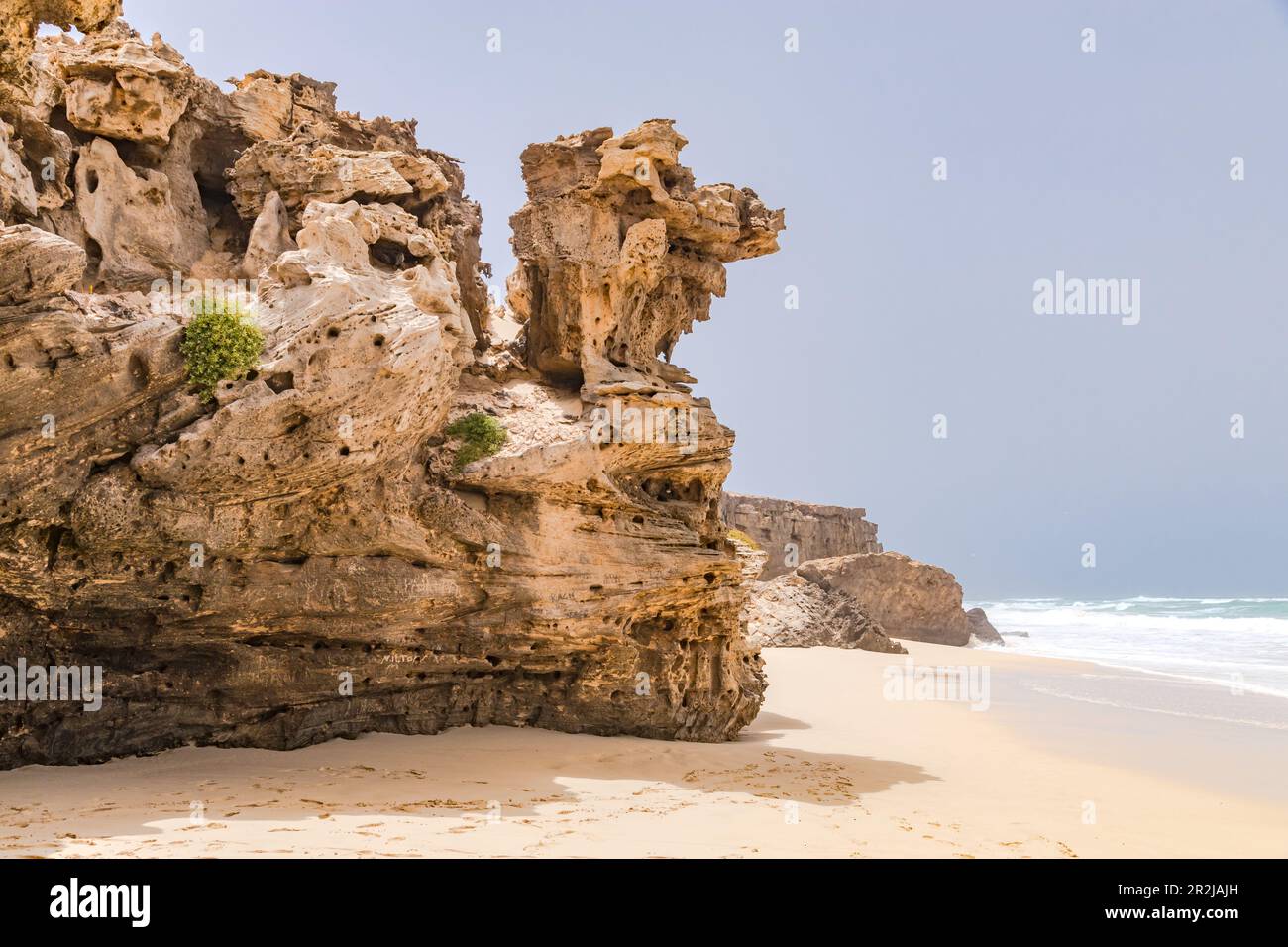 Rock formation at Praia da Varandinha beach on the southwest coast of ...