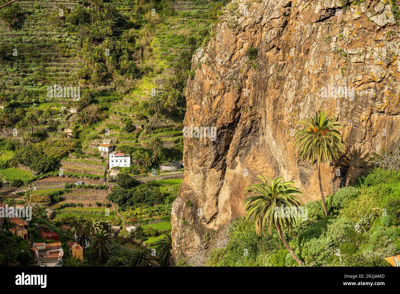 One of the twin rocks Roques de San Pedro, landmark of Hermigua, La Gomera, Canary Islands ...