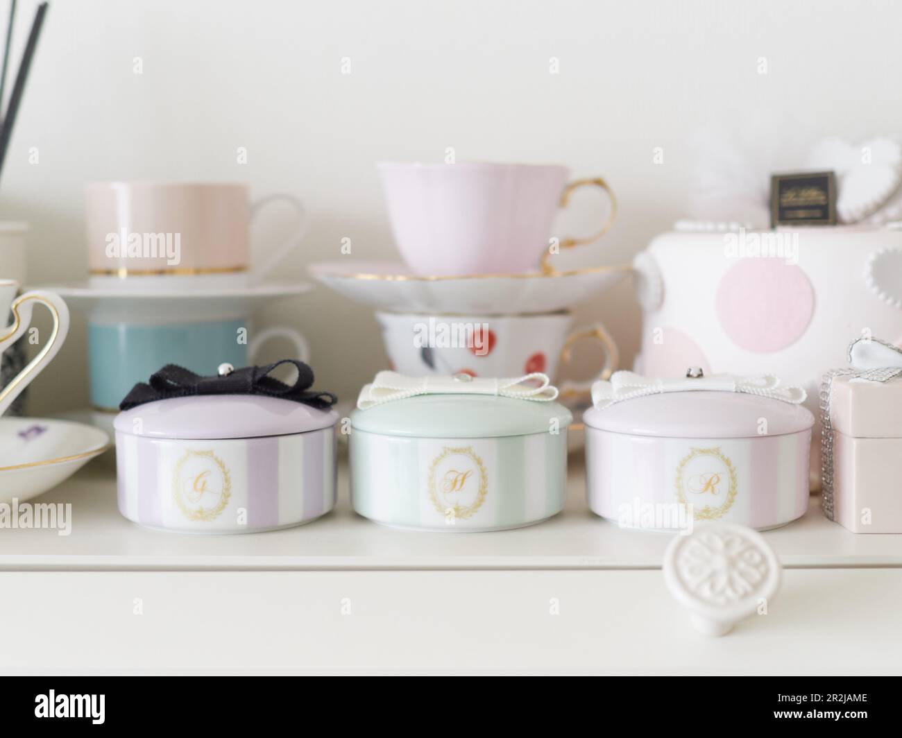 Handmade porcelain artifacts on a shelf Stock Photo - Alamy