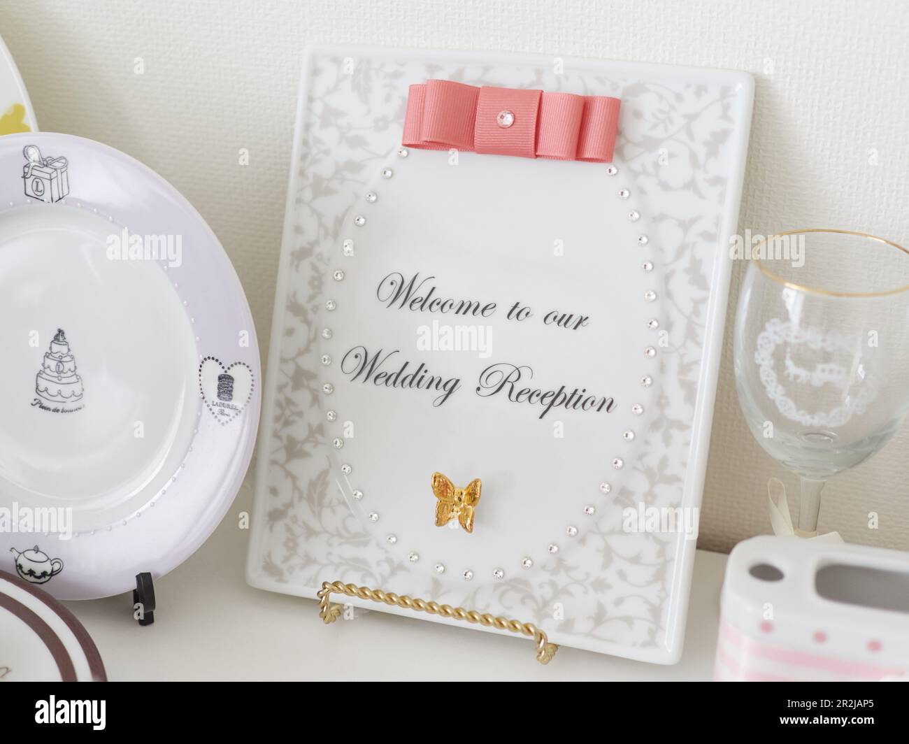 Welcome board at a wedding made of porcelain Stock Photo - Alamy