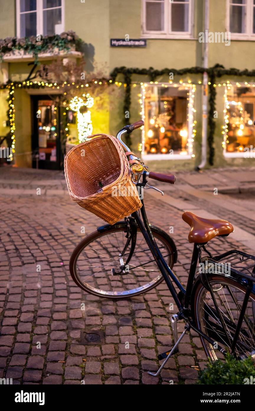 Nostalgic bicycle with a basket in downtown Copenhagen, Denmark Stock ...