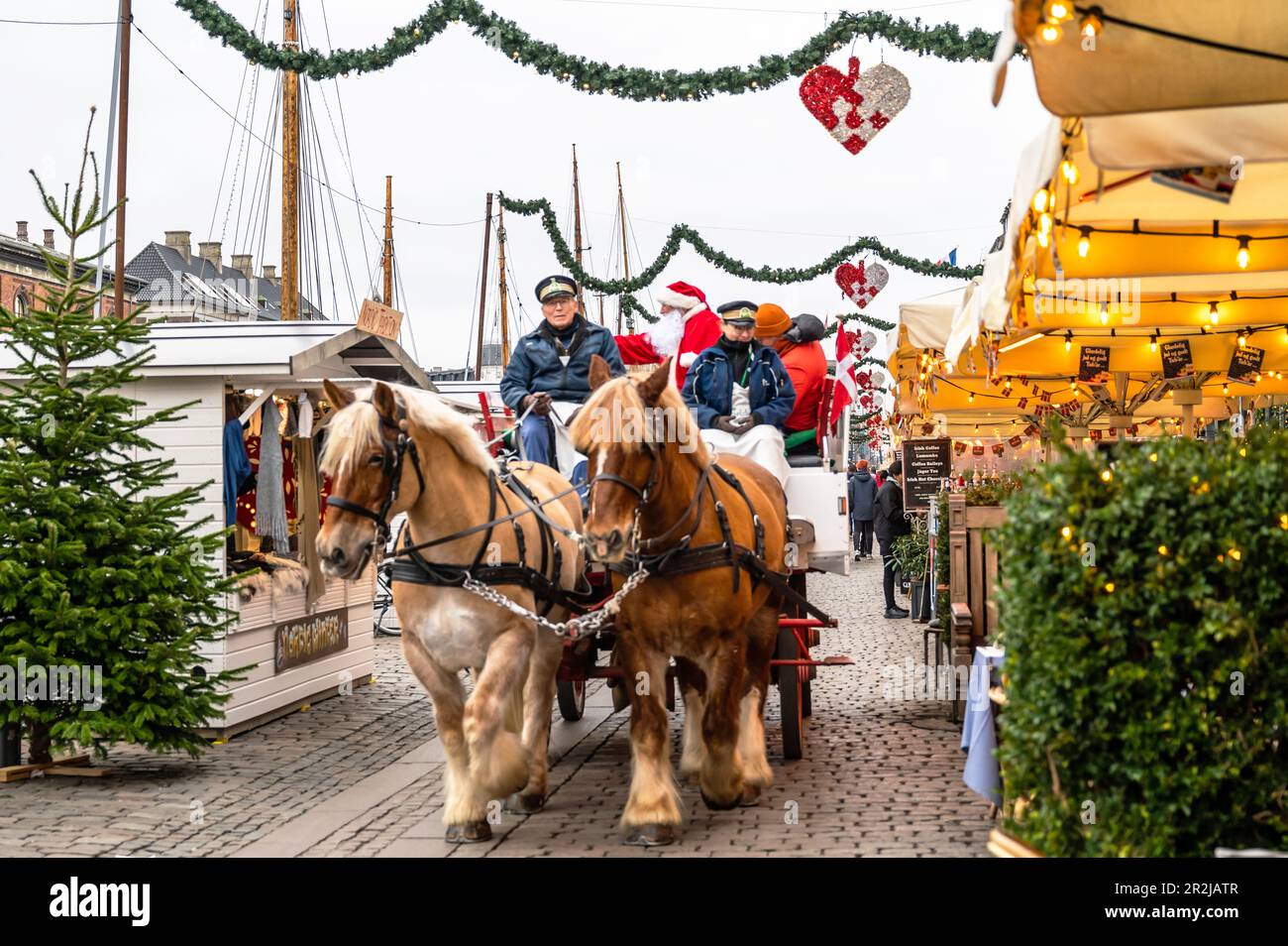 Horse drawn carriage with Santa Claus in Nyhavn harbour, Copenhagen ...