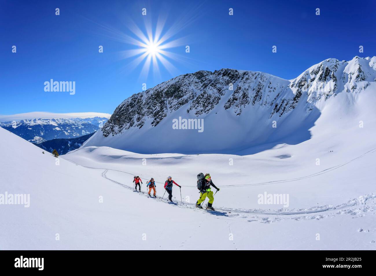 Four people on a ski tour ascending to the Kellerjoch, Kellerjoch ...