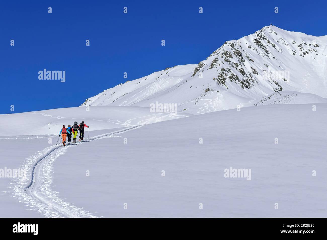 Four people on a ski tour ascending to the Kellerjoch, Kellerjoch ...