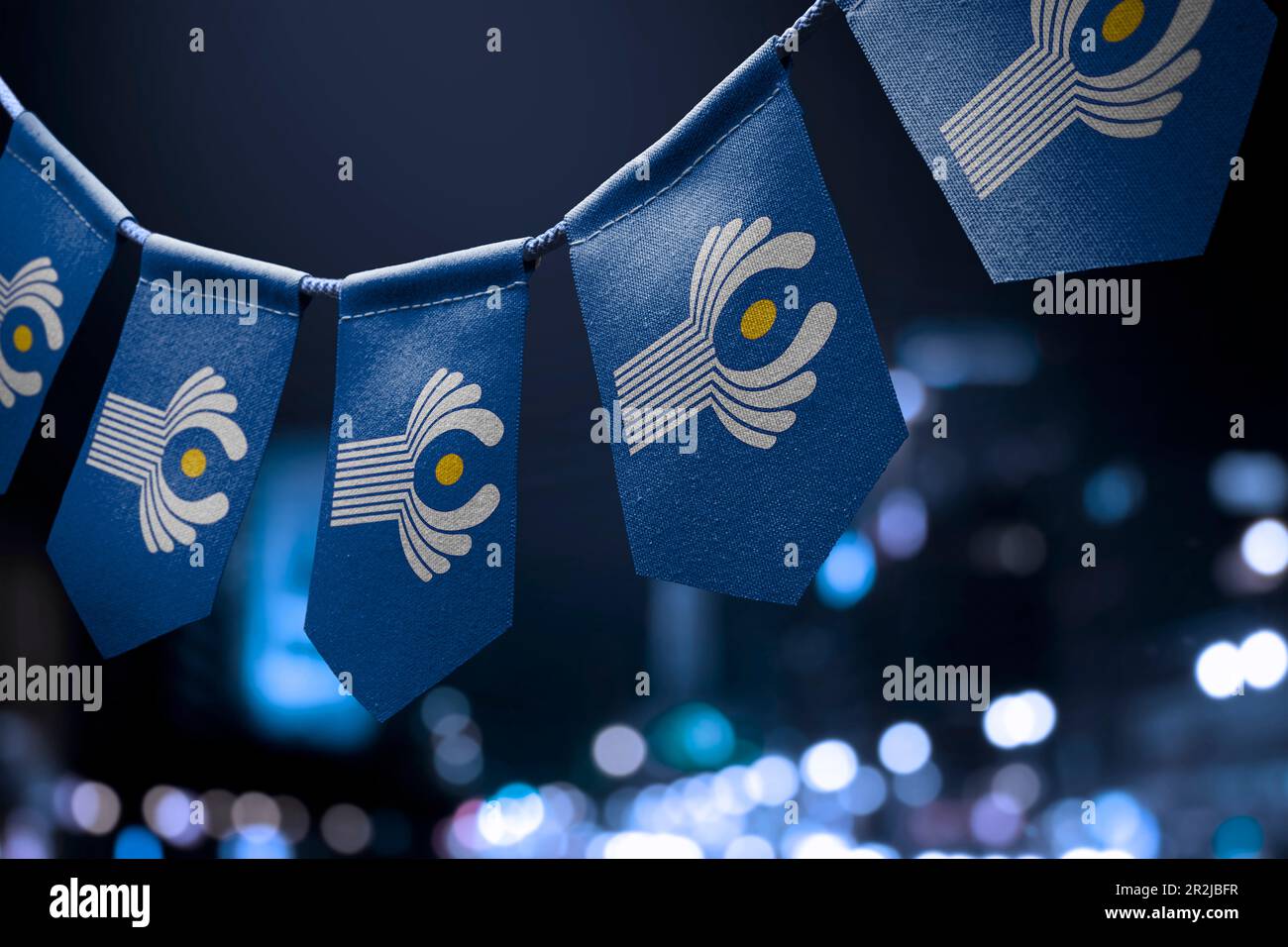 A garland of CIS national flags on an abstract blurred background Stock ...