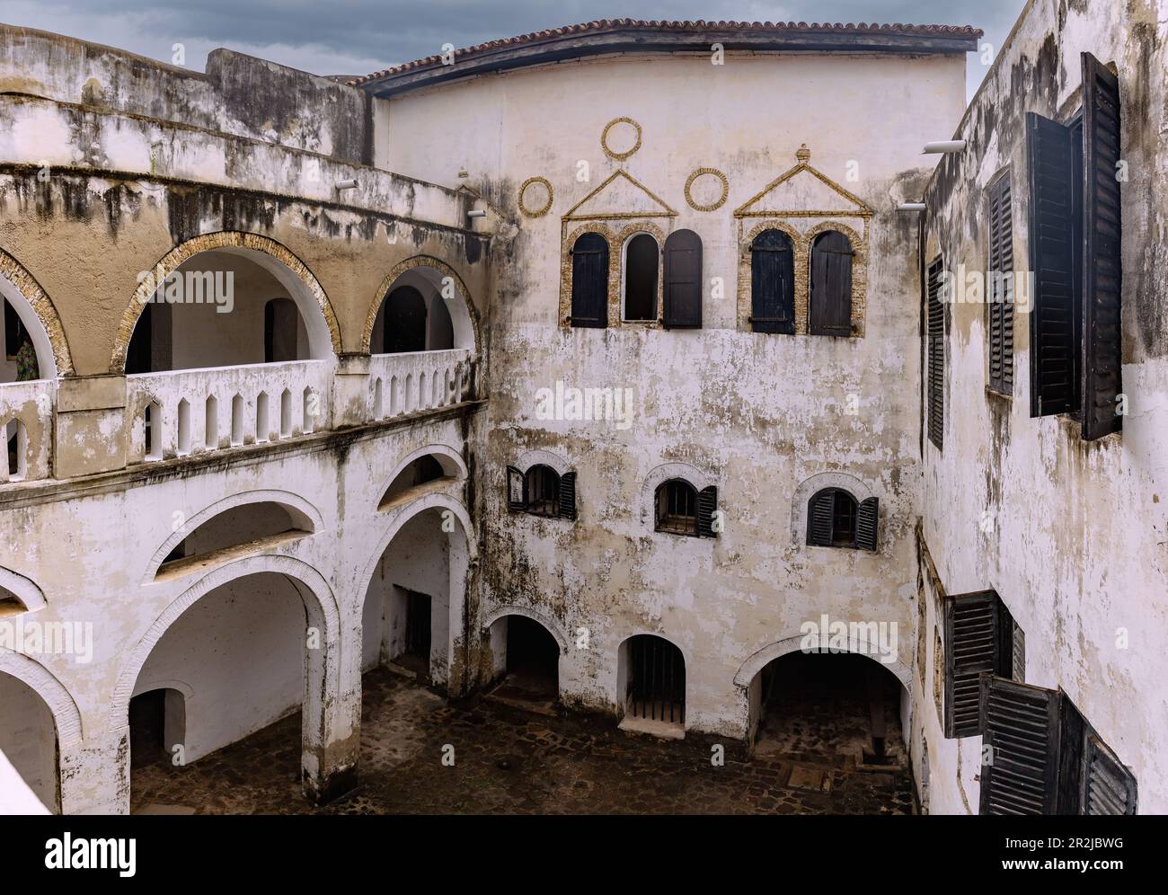 courtyard with. Entrance to the slave dungeons, church and governor's ...