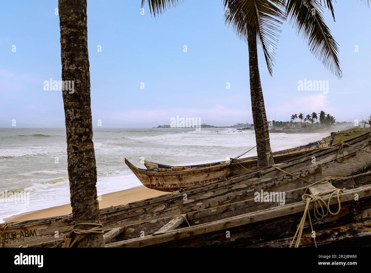 Elmina Beach with pirogues and view of Castle in Elmina on the Gold ...