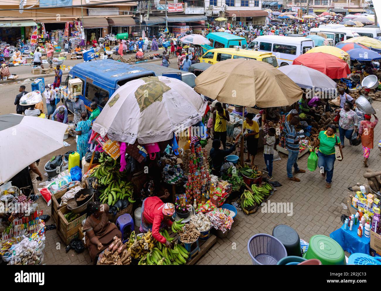 Market stalls selling ginger, plantains and yams in the Central Market ...