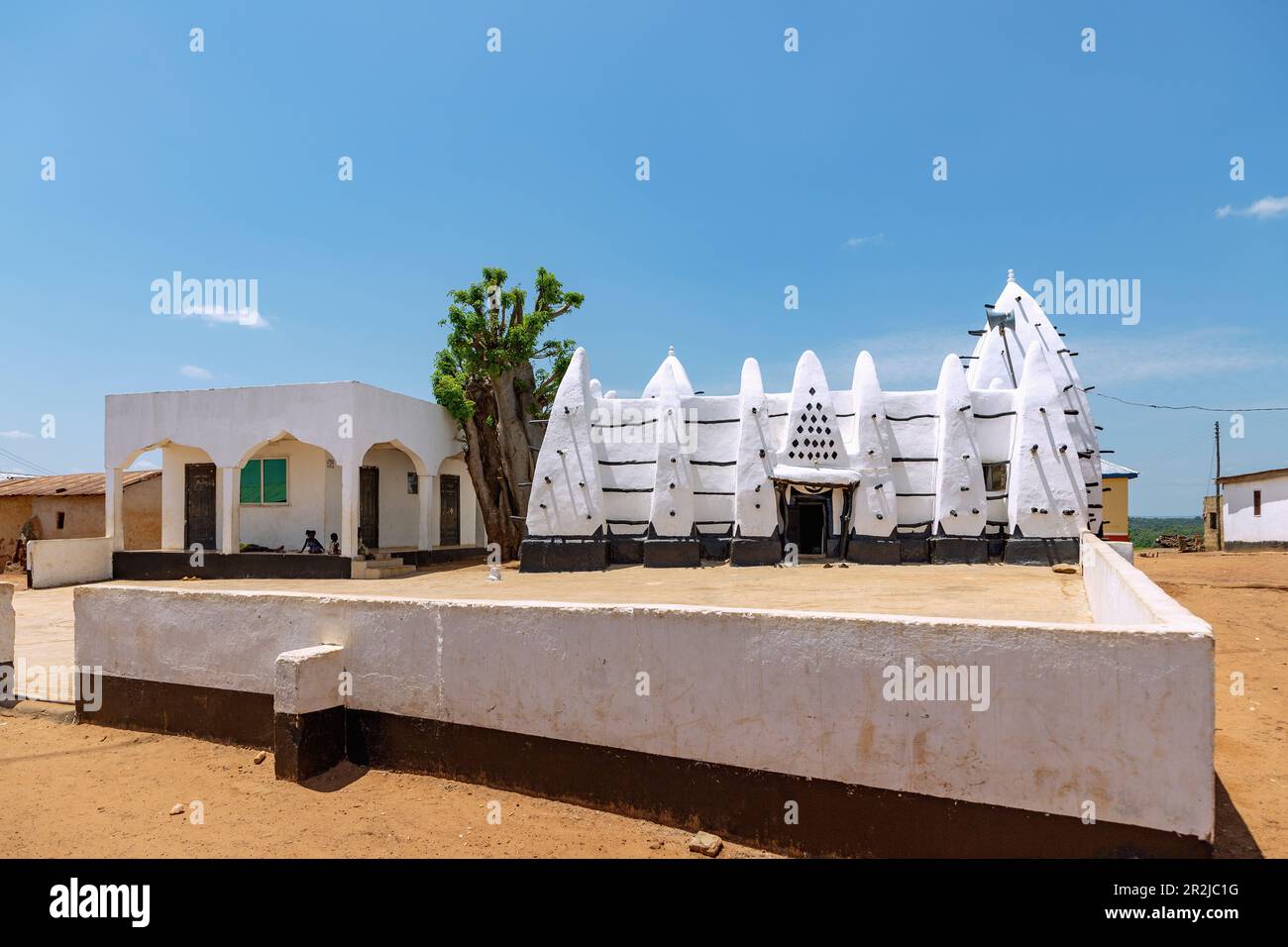Larabanga Mosque with baobab, men's main entrance, in the Savannah ...