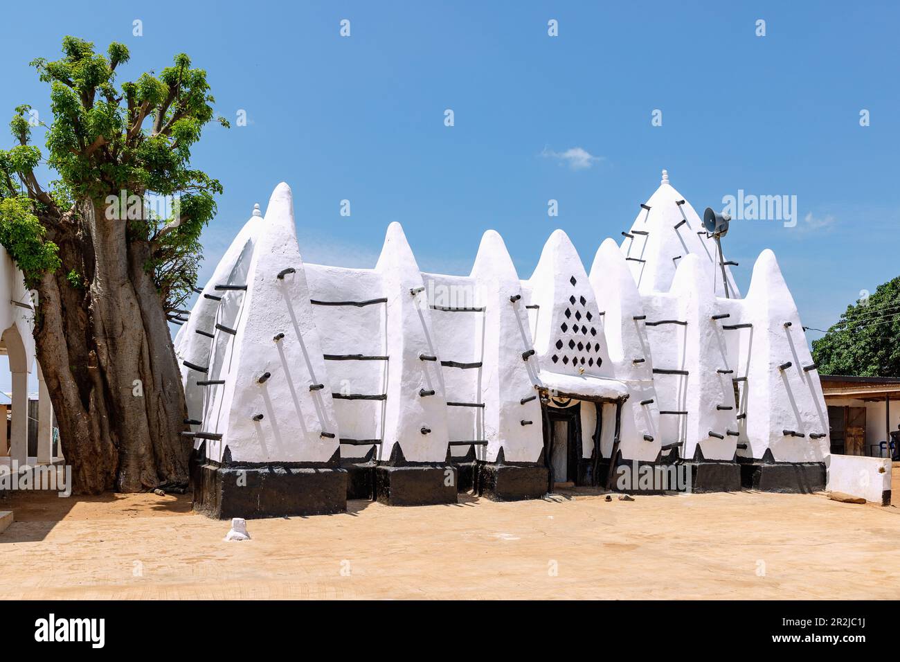 Larabanga Mosque with baobab, men's main entrance, in the Savannah ...