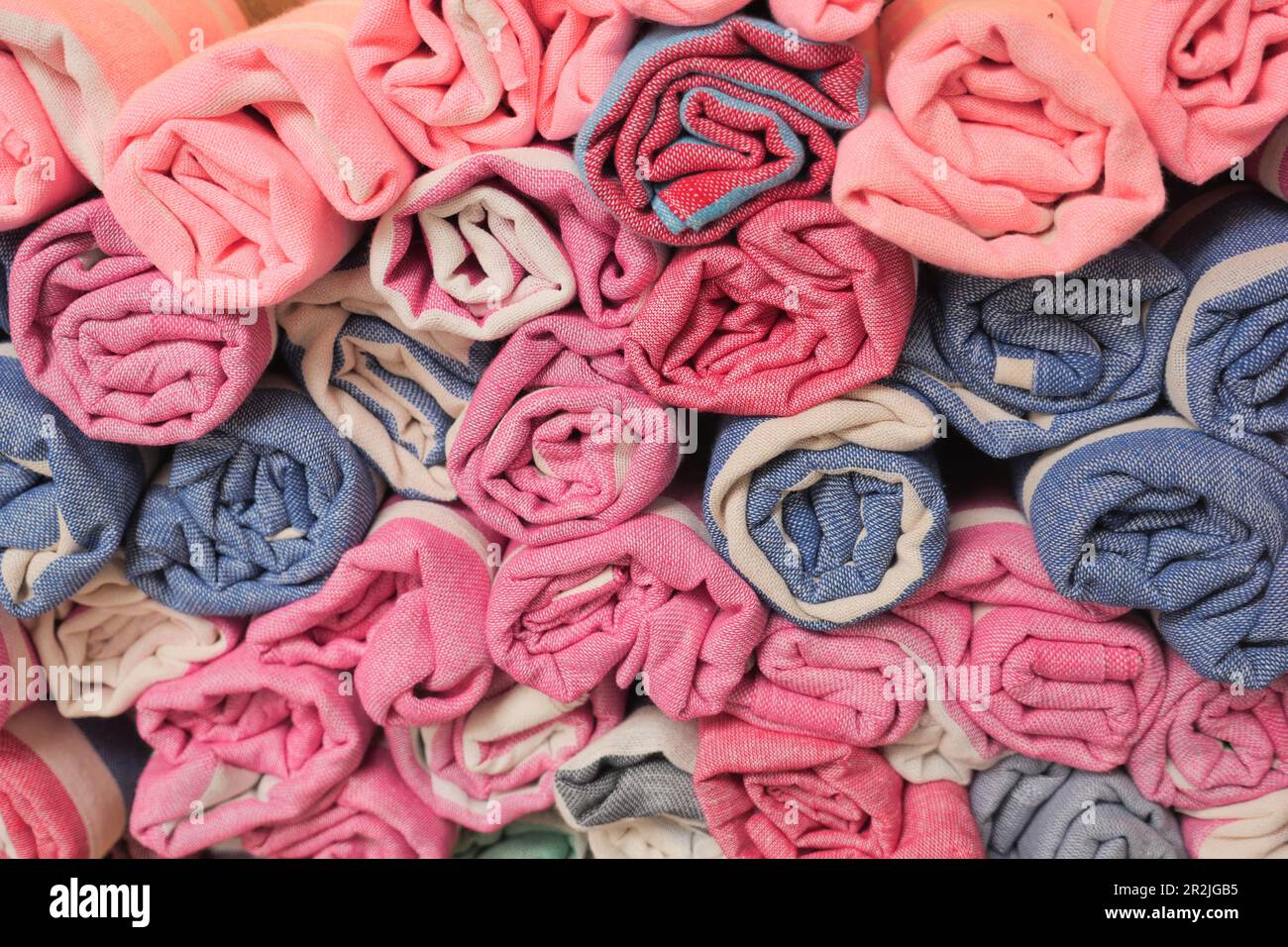 colorful fabrics, bedspreads and kerchiefs with different oriental ...