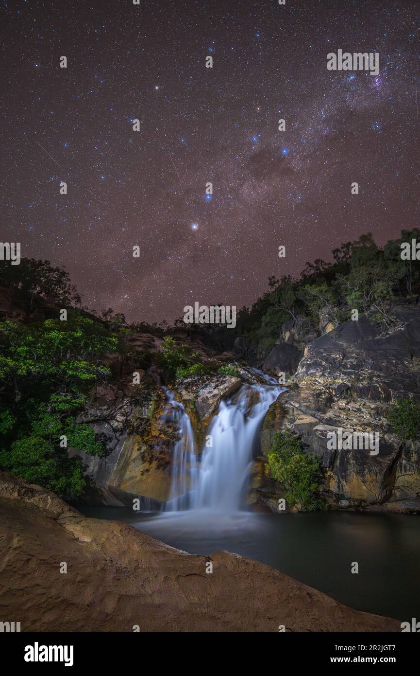 A stunning, nightscape image of Emerald Creek Falls traversed by the ...