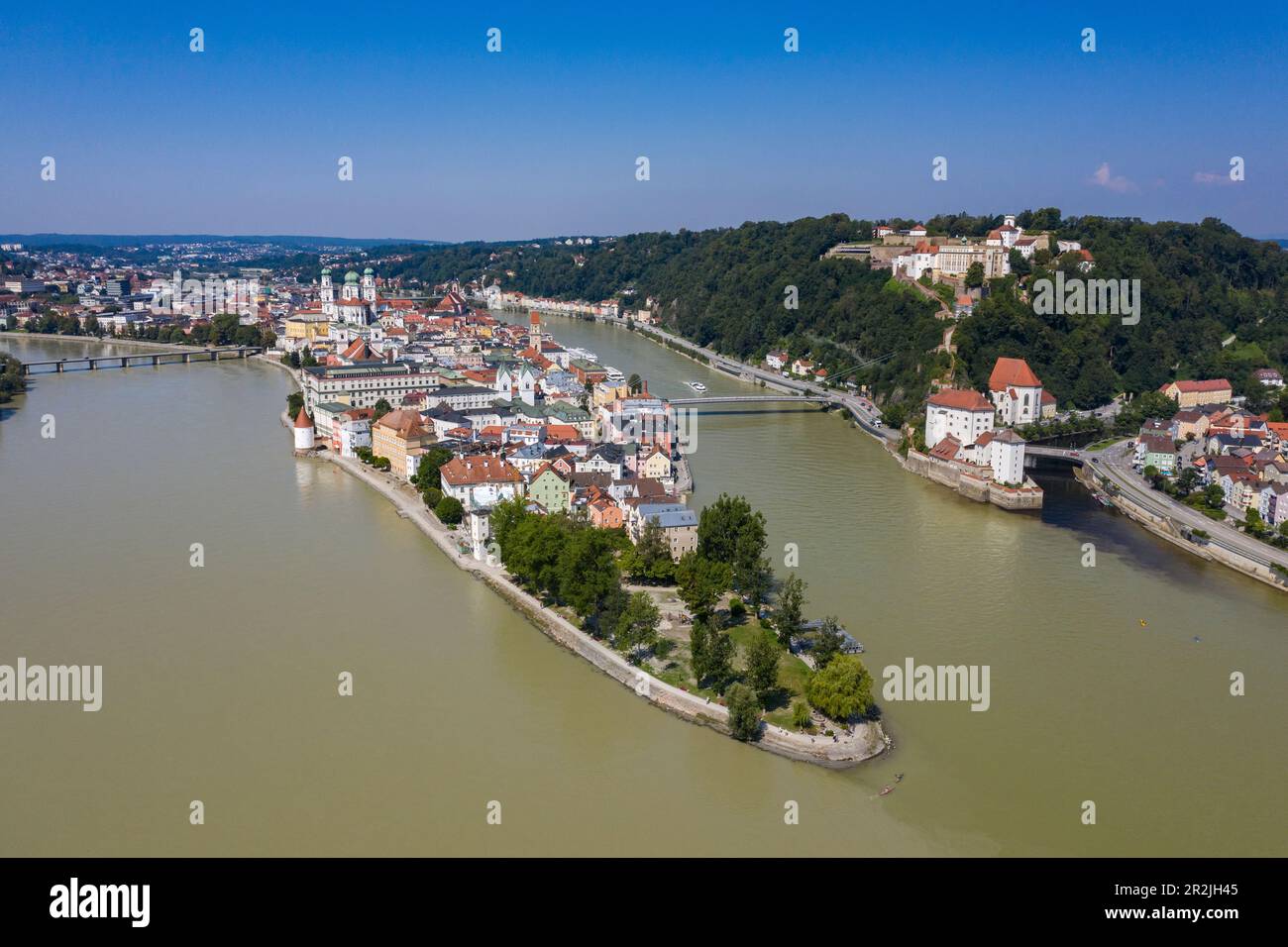 Aerial view of the city at the confluence of the Inn (left), Danube (middle) and Ilz (right ...