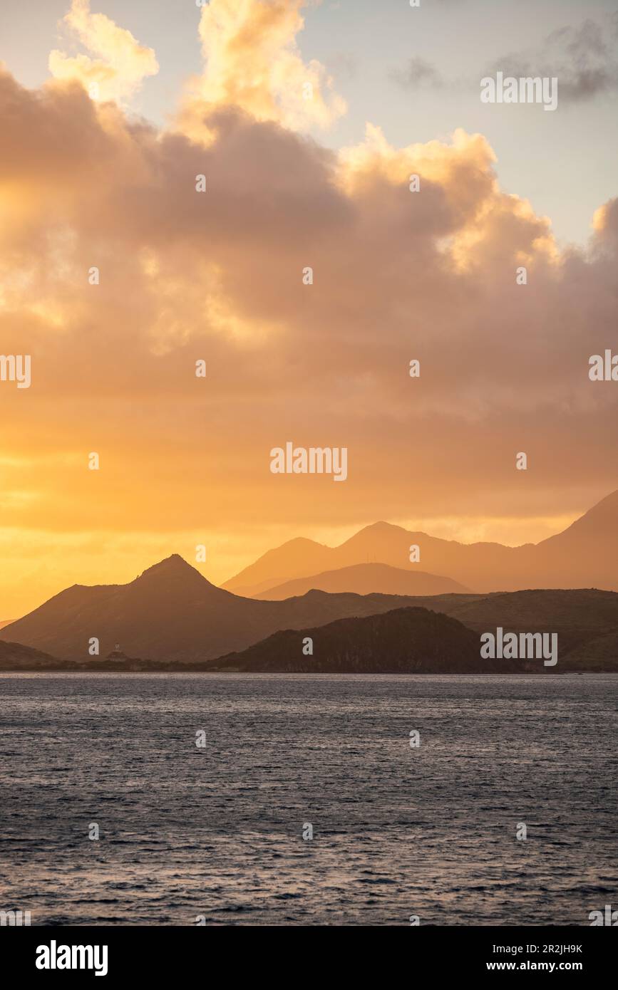 Mountains rise out from ocean hi-res stock photography and images - Alamy