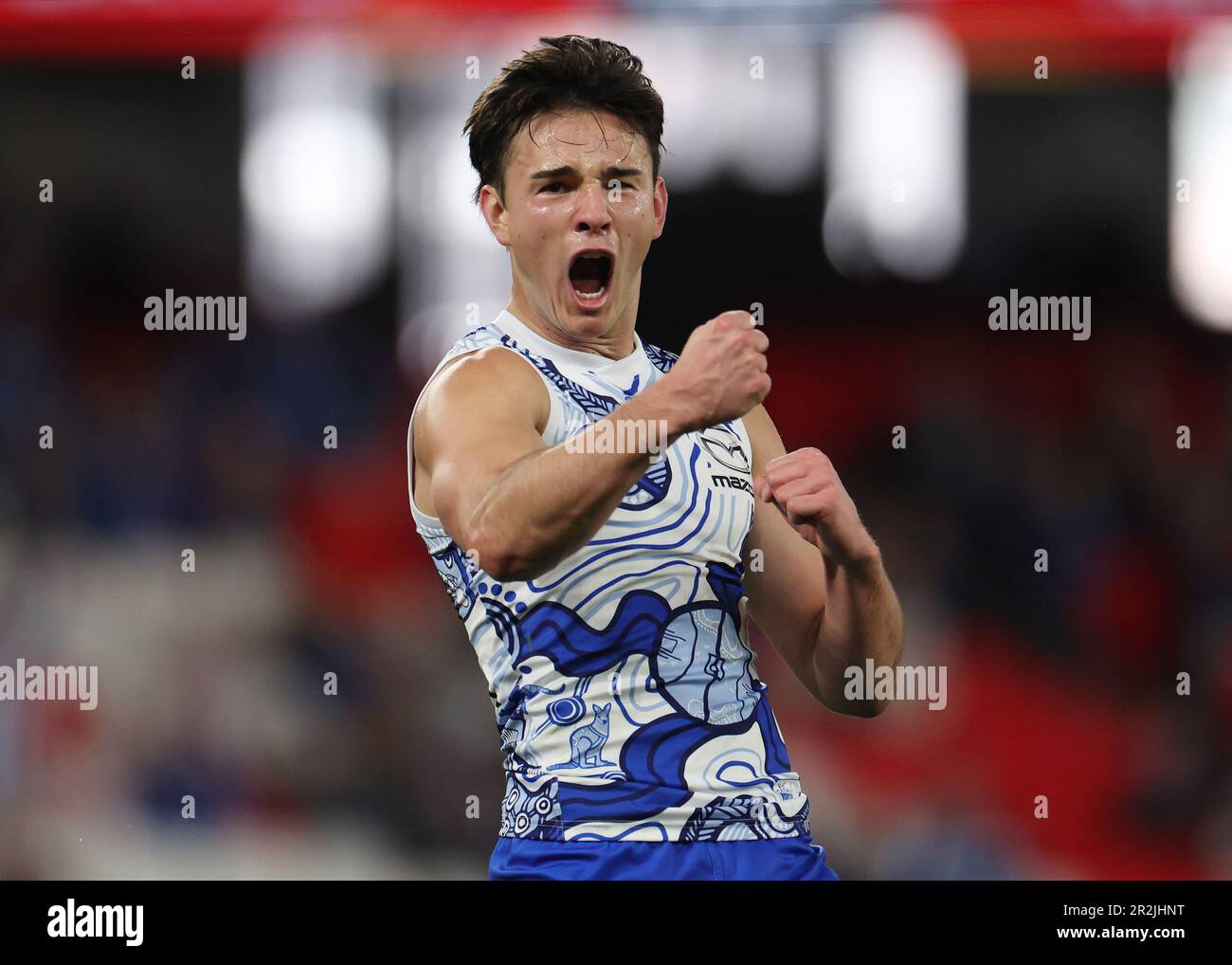 Eddie Ford of the Kangaroos celebrates a goal during the AFL Round 10 ...