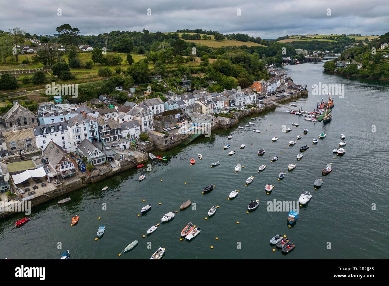 Aerial view of fishing boats in Fowey Harbor and town, Fowey, Cornwall ...