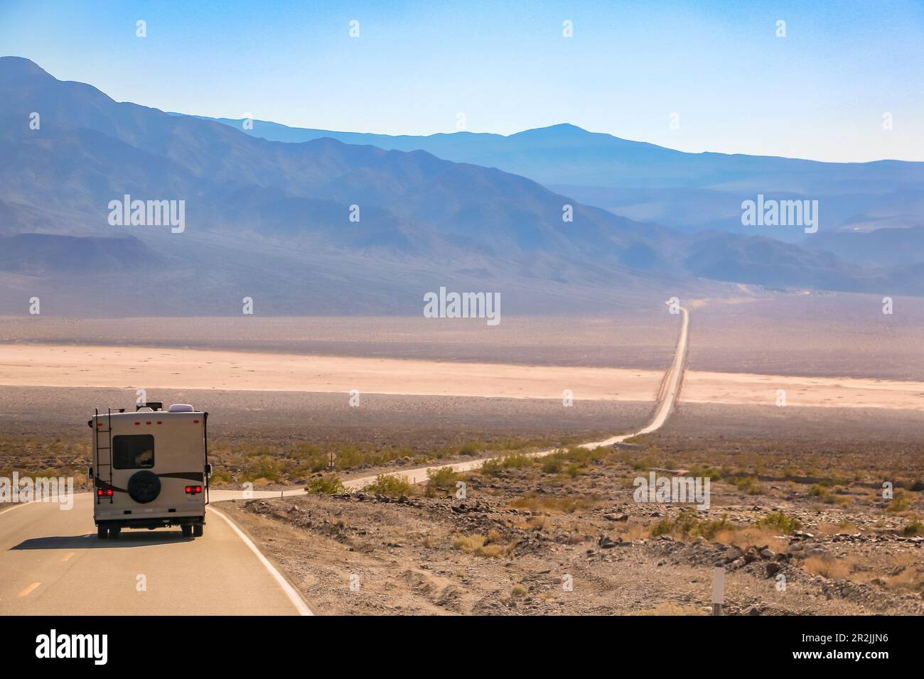 A lone motorhome travels the Nadeau Trail through the hot plateau in ...