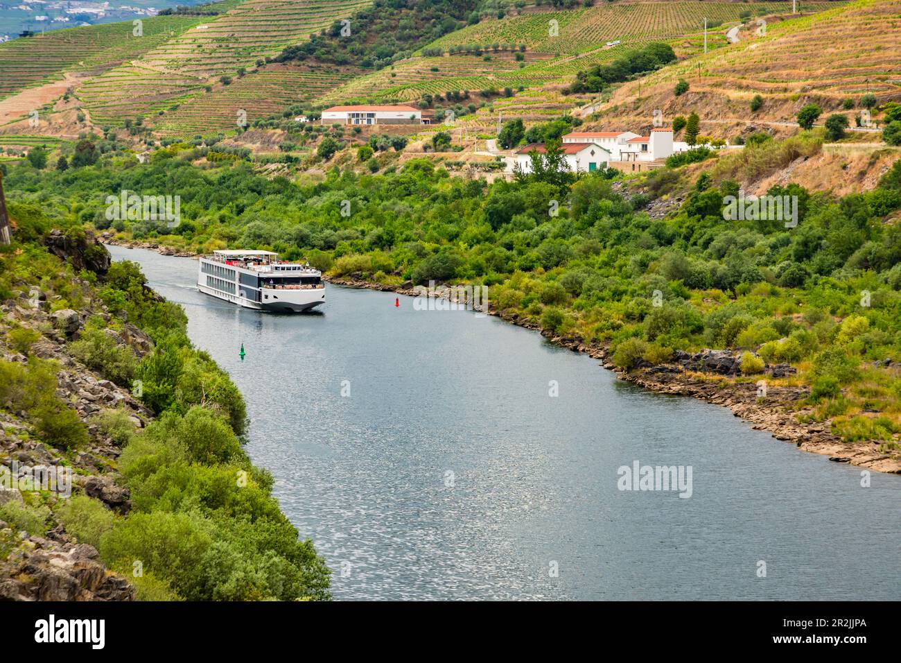 A cruise ship on the Douro River in the Alto Douro wine region, Regua ...