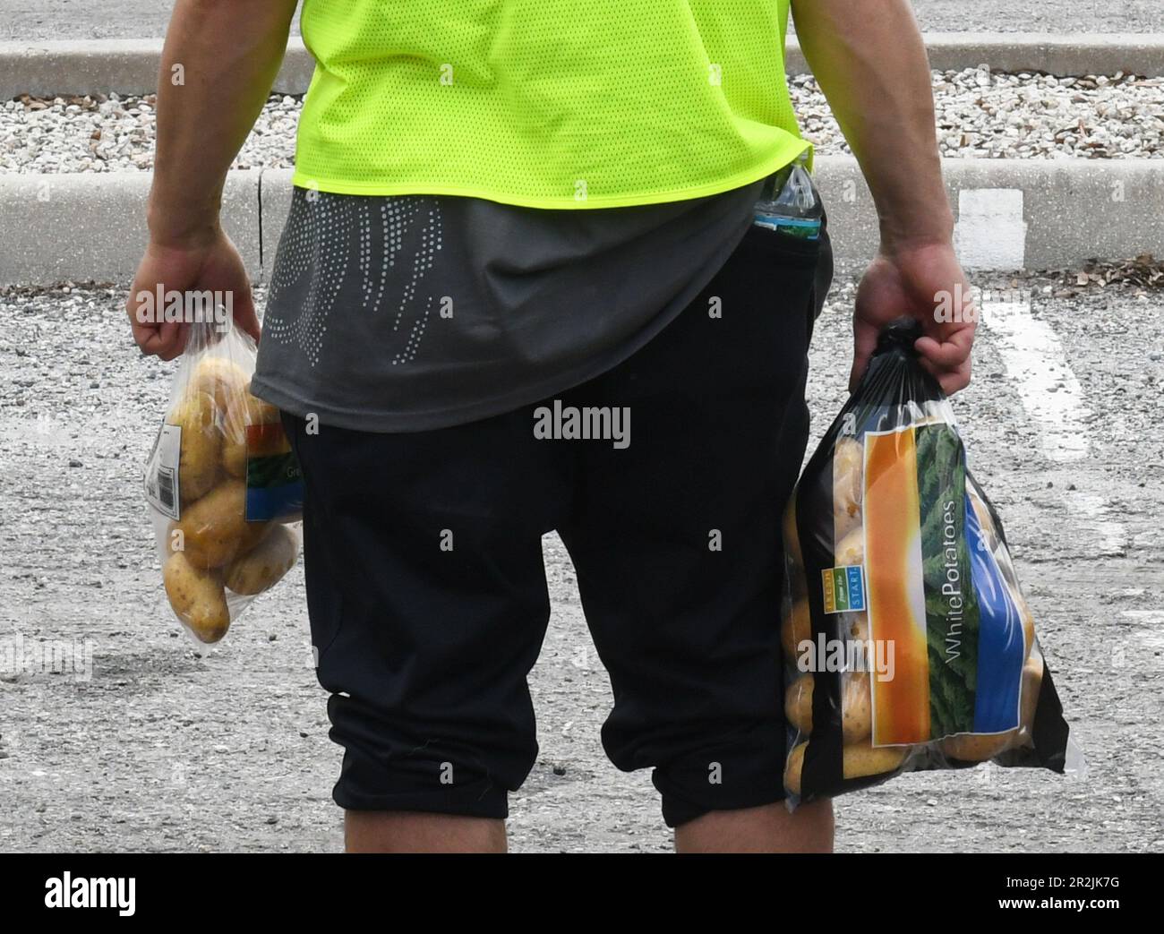 Orlando, United States. 19th May, 2023. A volunteer waits to place bags ...