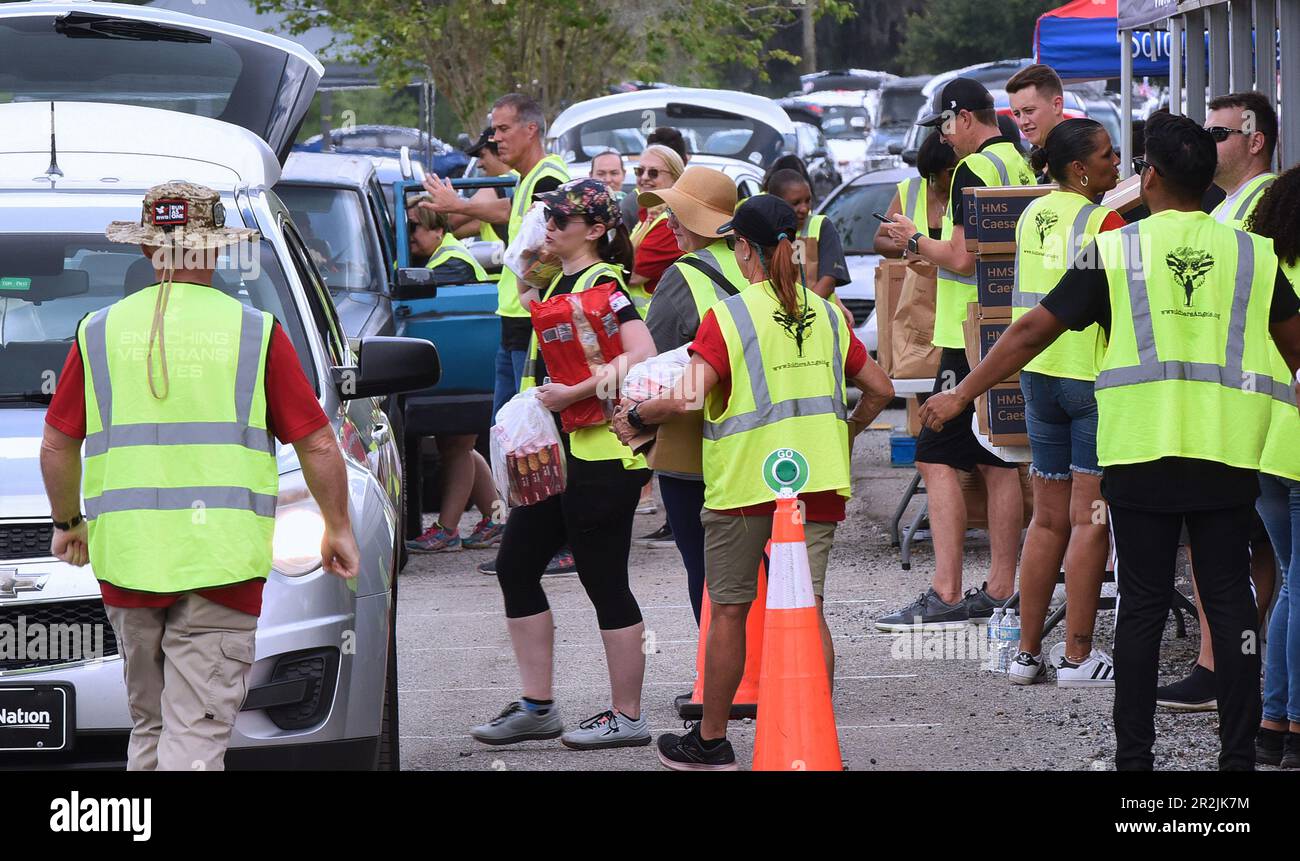 Orlando, United States. 19th May, 2023. Volunteers place food items in ...