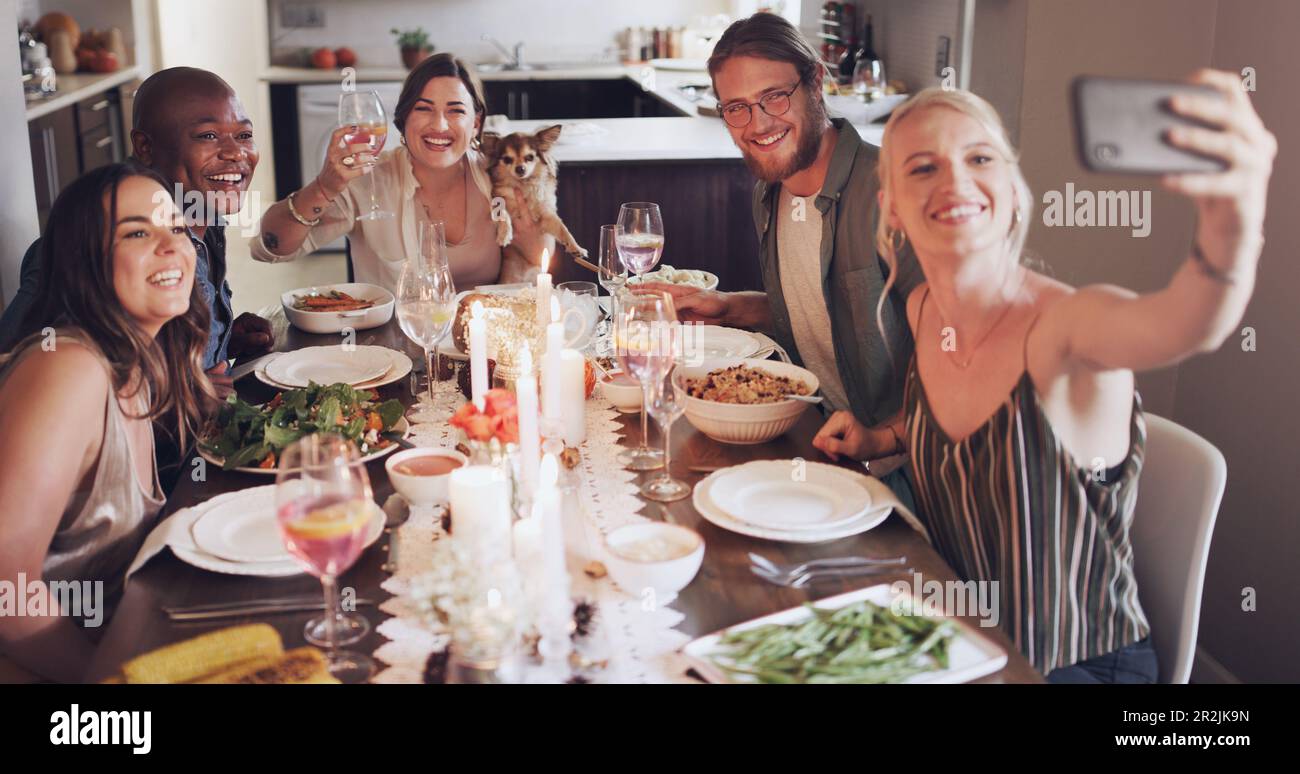 Diversity, dining table and friends taking a selfie at dinner, party or event at a modern home ...