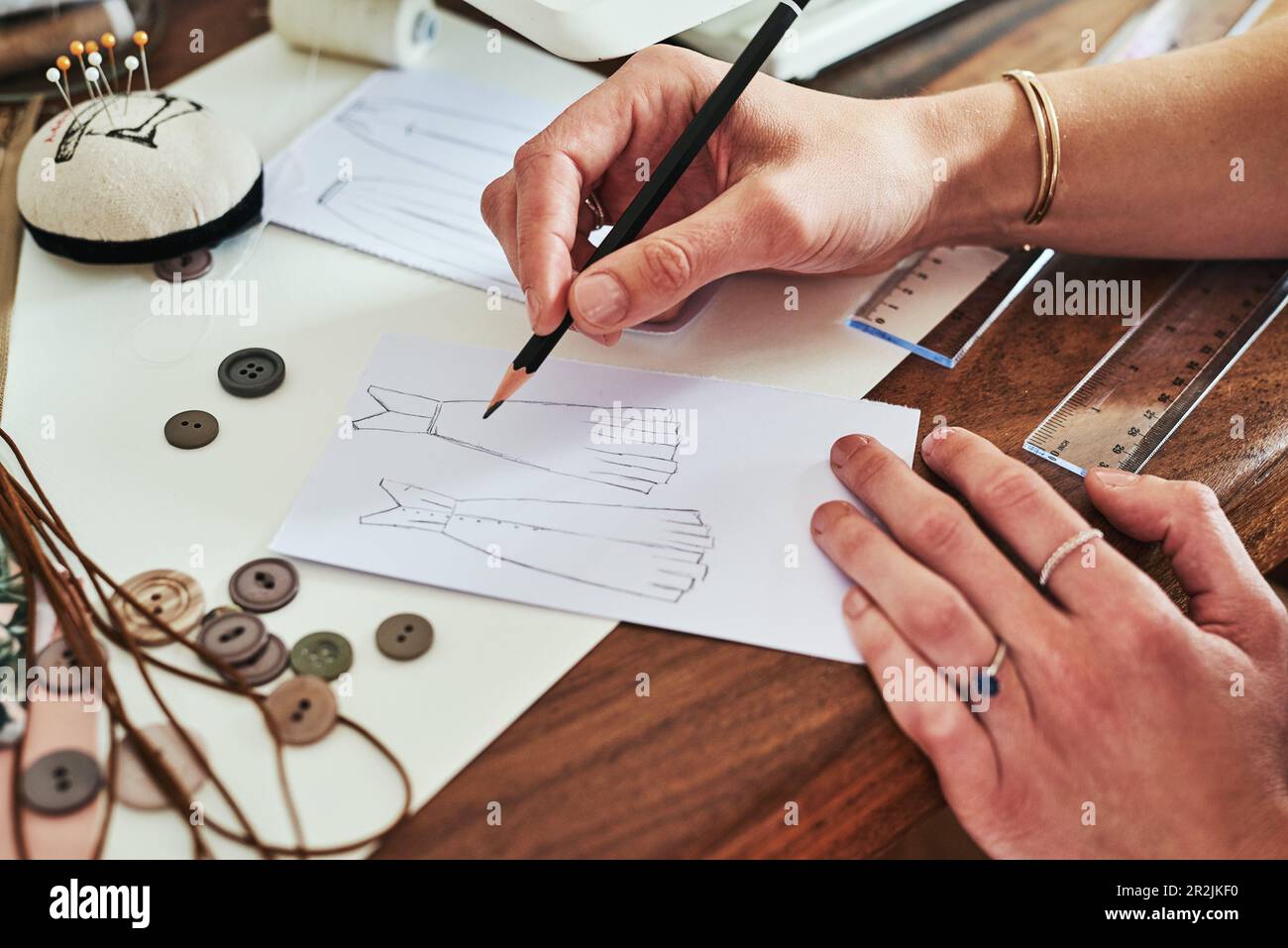 Woman, hands and fashion design drawing for planning, idea or sketching ...