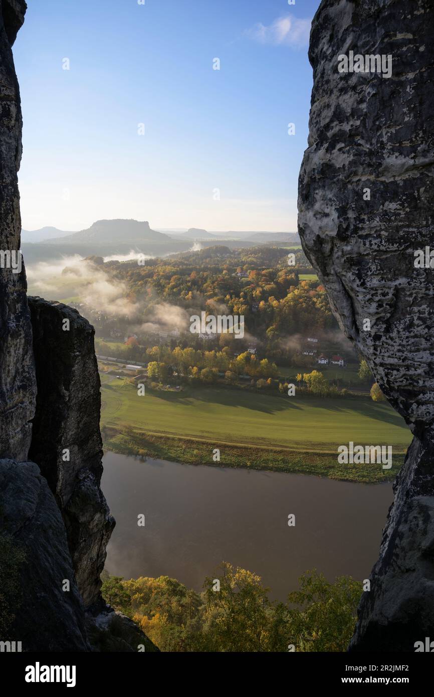 View through rocks at the Bastei Bridge to the Table Mountain ...