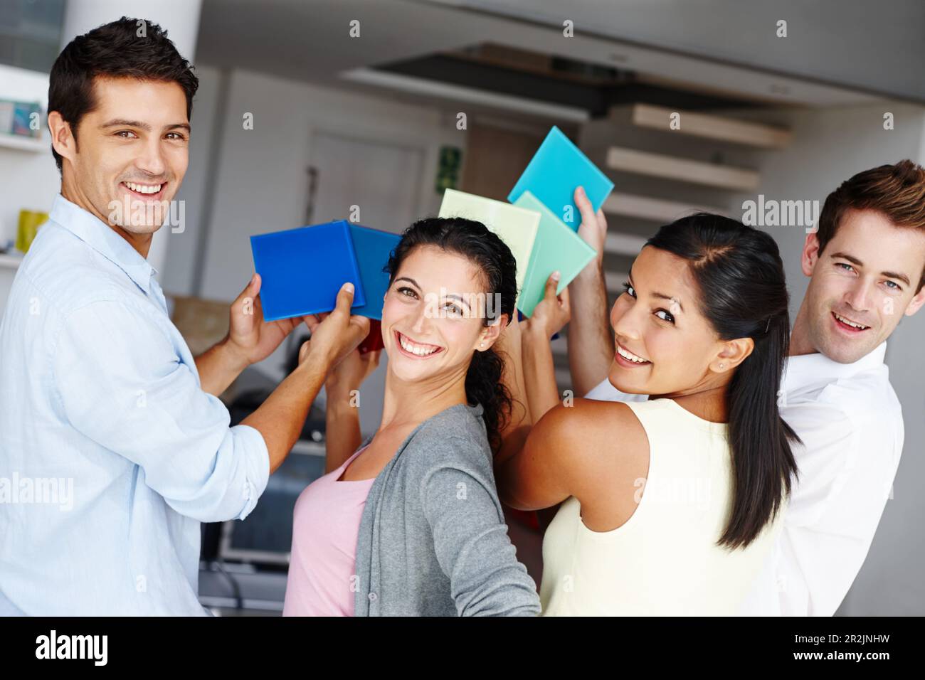 Which one should we choose. A team of creative colleagues trying to ...