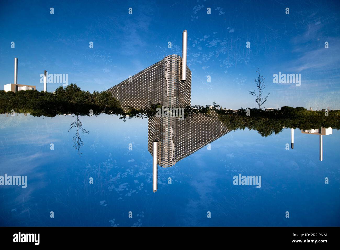 Double exposure of Copenhill, a waste to energy plant that houses a ski ...