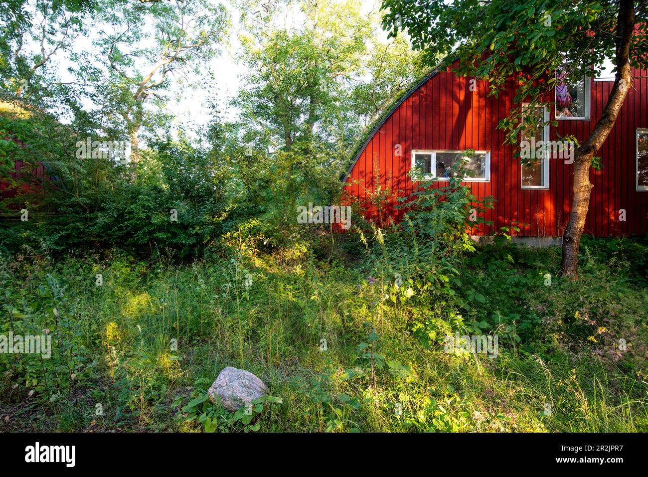 Arched buidling with red cladding in copenhagen, Denmark Stock Photo ...