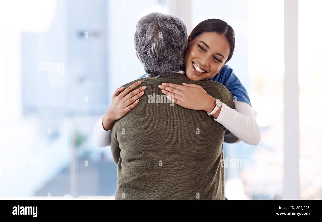 Healthcare, hug and nurse with senior woman, care and diagnosis with ...