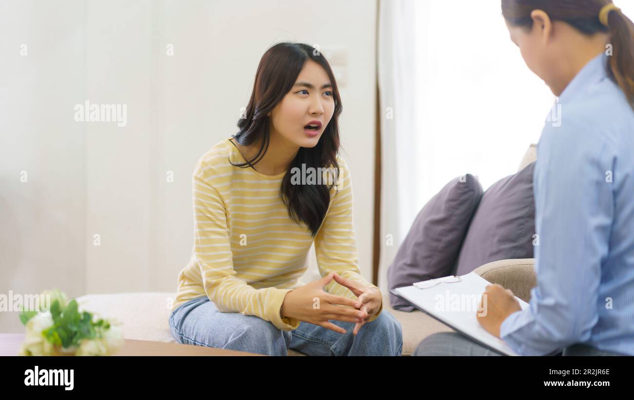 Female psychologist counseling for mental problem of stress patient and ...