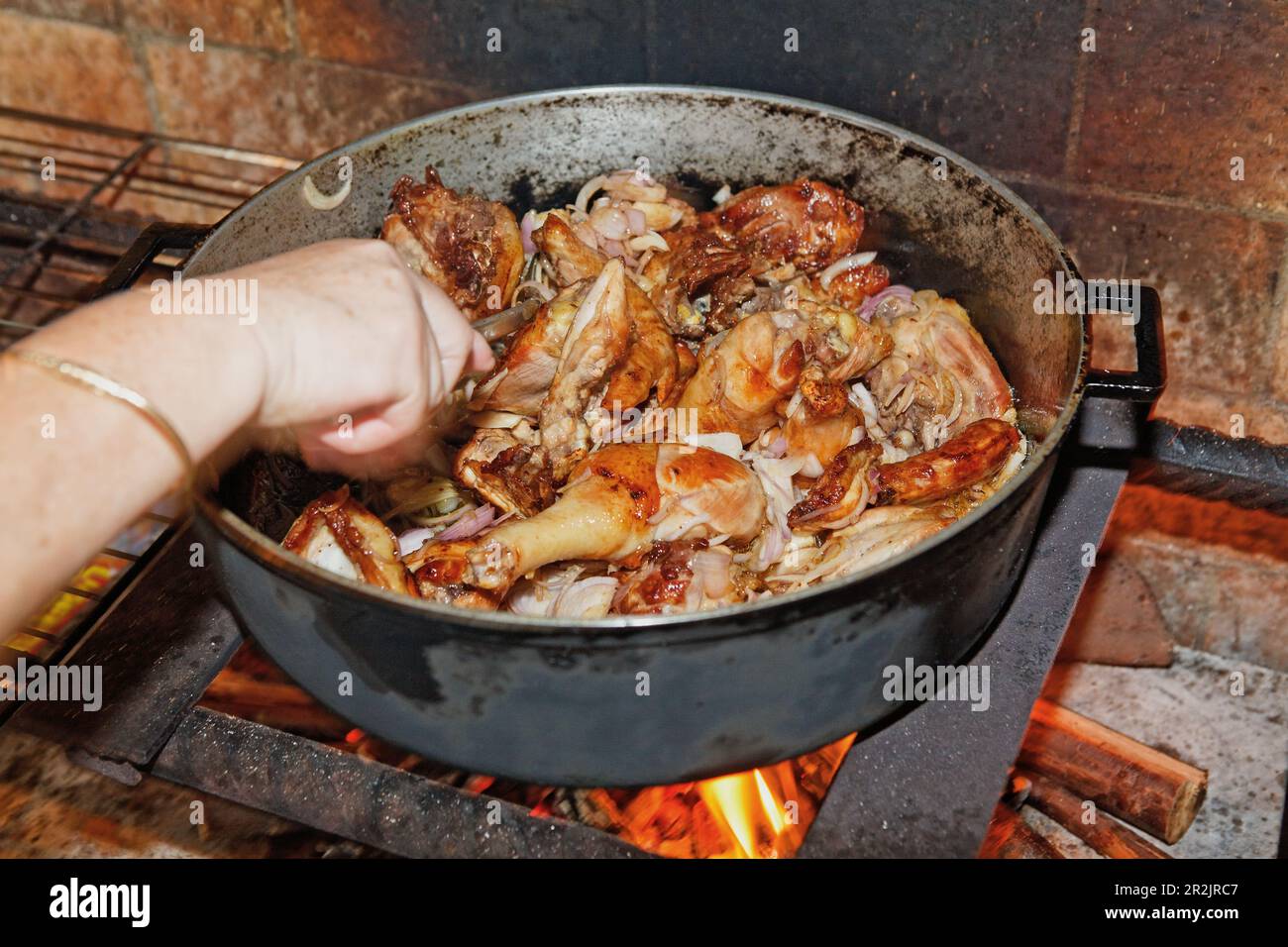 Person cooking chicken curry hi-res stock photography and images - Alamy