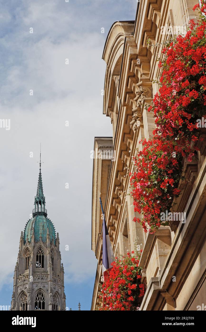 Facade of the town hall, Hotel de Ville and steeple of the cathedral ...