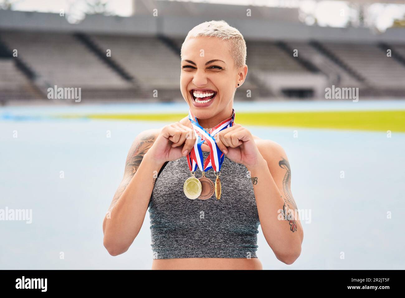 Woman with medals hi-res stock photography and images - Alamy