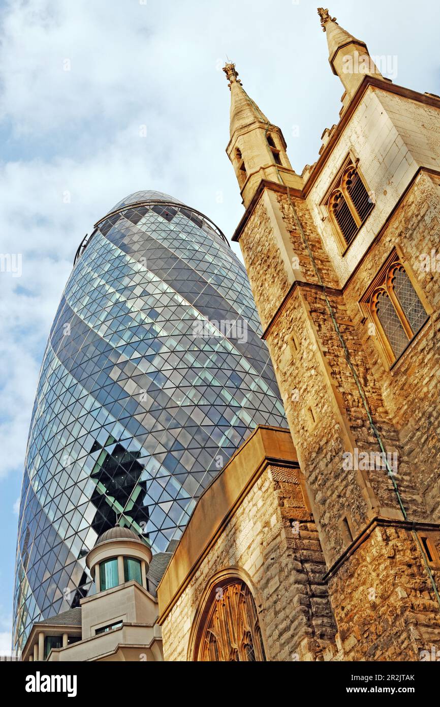St. Andrew Undershaft and The Gherkin Building, City, London, England ...