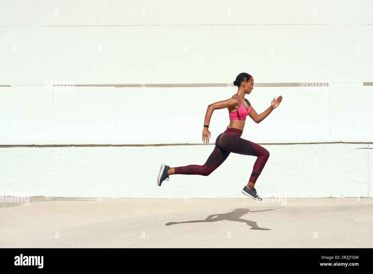 Woman, fitness and running on mockup for training, exercise or healthy ...
