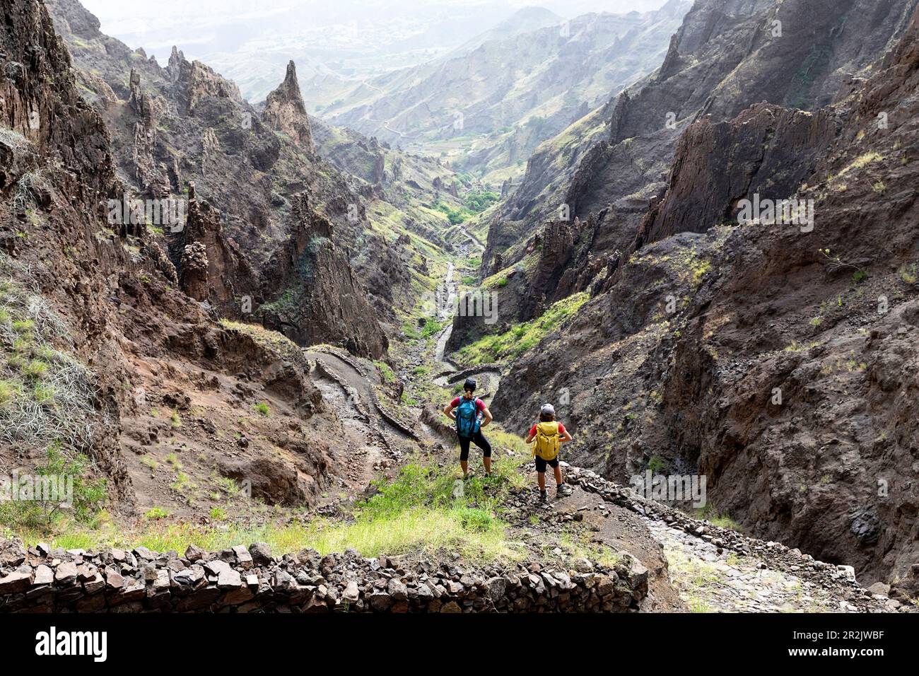 Mother and son, tourists, hikers on a spectacular hiking trail to Cha ...