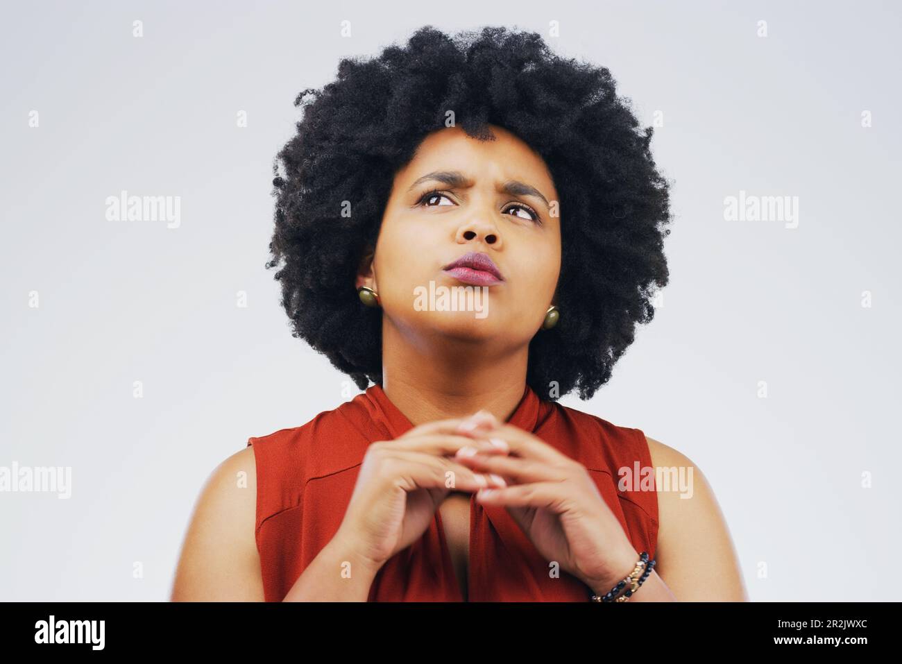 Confused, doubt and woman in studio thinking on mockup, copy space and ...