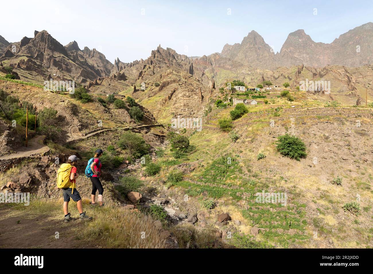 Mother and son, tourists, hikers at the start of a spectacular hiking ...