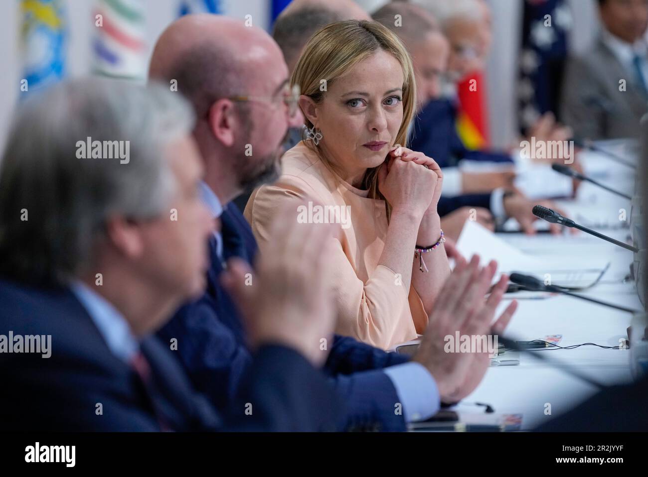 Italian Prime Minister Giorgia Meloni reacts during a G7 working ...
