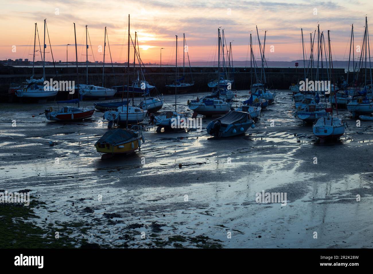Musselburgh harbour in Scotland at sunset on a lovely summers evening ...