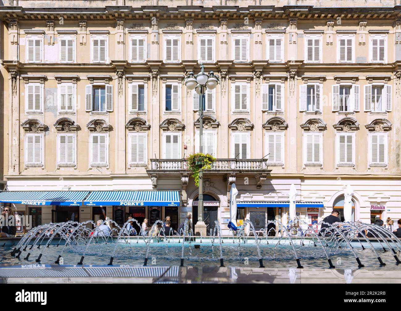 Rijeka; Trg Jadranski, fountain and palace with baroque facade Stock ...